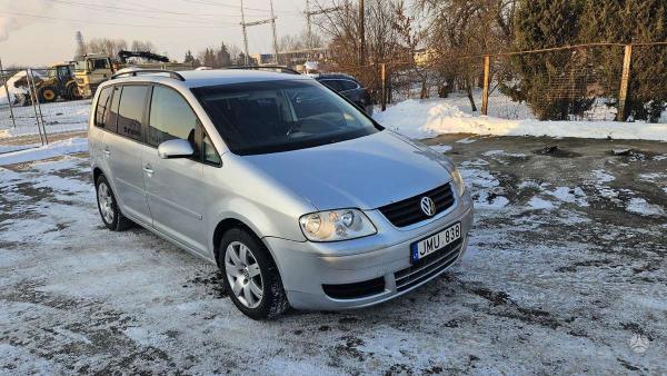 Grey Volkswagen Touran 2005 in Kaunas, with an engine capacity of 1.90 L and mileage of 351 thousand km for 2100 €, photo 1 on AUTOMOTO.COM.LV
