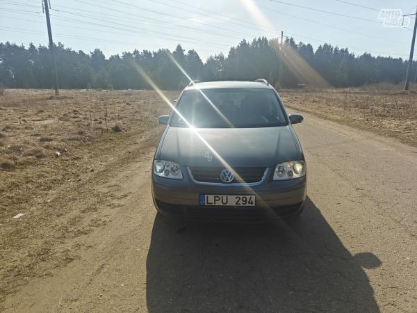 Pelēks Volkswagen Touran 2005 Jonava, ar dzinēja tilpumu 2.00 L un nobraukumu 279 tūkst. km par 1900 €, foto 1 vietnē AUTOMOTO.COM.LV