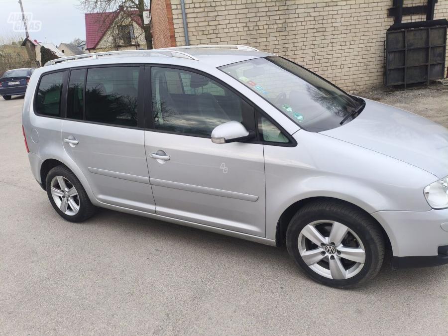 Grey Volkswagen Touran 2005 in Joniskis, with an engine capacity of 1.90 L and mileage of 233 thousand km for 1999 €, photo 17 on AUTOMOTO.COM.LV