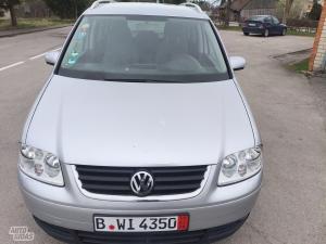 Grey Volkswagen Touran 2005 in Joniskis, with an engine capacity of 1.90 L and mileage of 233 thousand km for 1999 €, photo 18 on AUTOMOTO.COM.LV