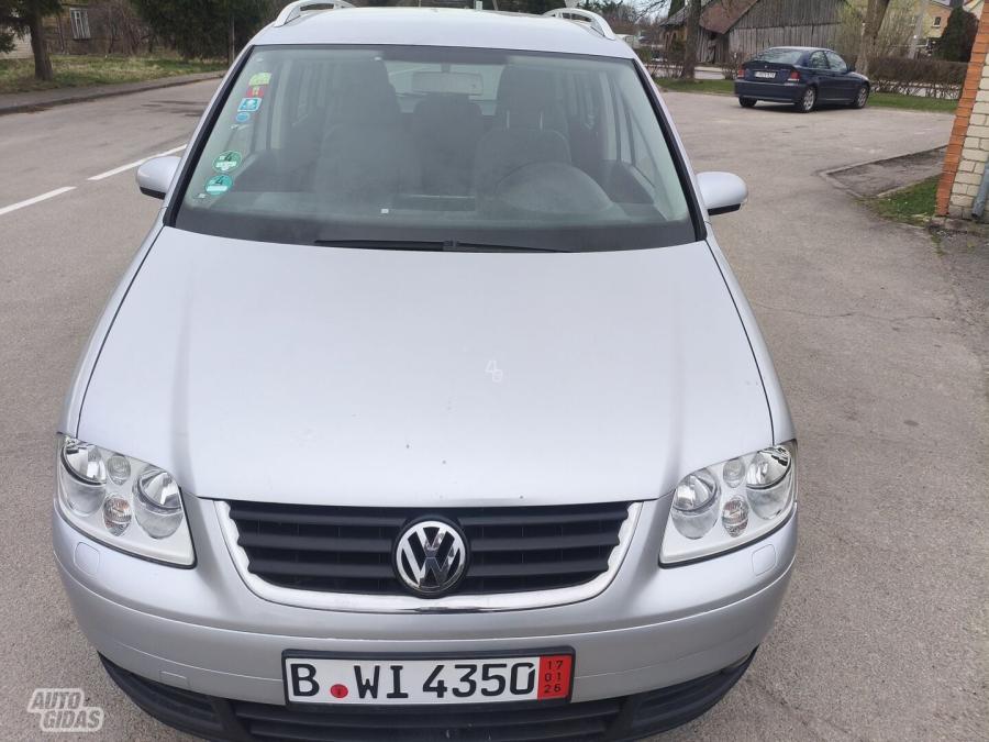 Grey Volkswagen Touran 2005 in Joniskis, with an engine capacity of 1.90 L and mileage of 233 thousand km for 1999 €, photo 18 on AUTOMOTO.COM.LV