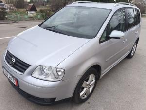 Grey Volkswagen Touran 2005 in Joniskis, with an engine capacity of 1.90 L and mileage of 233 thousand km for 1999 €, photo 19 on AUTOMOTO.COM.LV