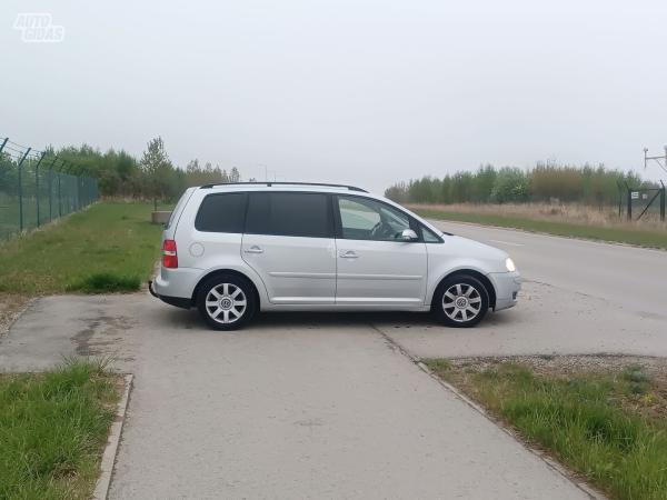 Grey Volkswagen Touran 2005 in Siauliai, with an engine capacity of 1.90 L and mileage of 340 thousand km for 1290 €, photo 2 on AUTOMOTO.COM.LV