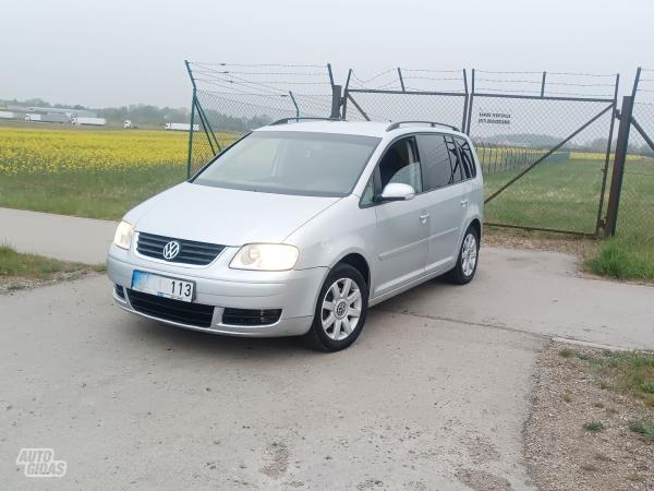Grey Volkswagen Touran 2005 in Siauliai, with an engine capacity of 1.90 L and mileage of 340 thousand km for 1290 €, photo 5 on AUTOMOTO.COM.LV