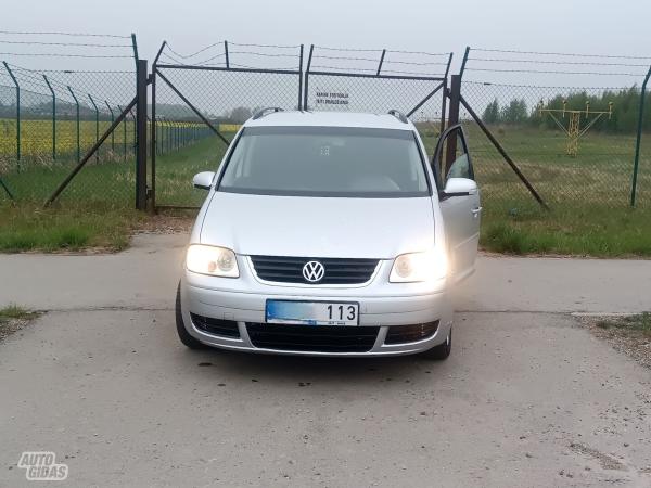 Grey Volkswagen Touran 2005 in Siauliai, with an engine capacity of 1.90 L and mileage of 340 thousand km for 1290 €, photo 6 on AUTOMOTO.COM.LV