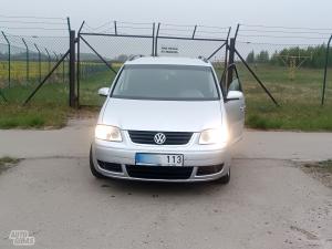 Grey Volkswagen Touran 2005 in Siauliai, with an engine capacity of 1.90 L and mileage of 340 thousand km for 1290 €, photo 7 on AUTOMOTO.COM.LV