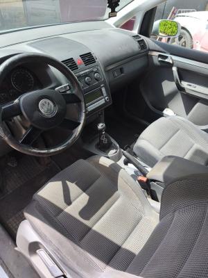 Grey Volkswagen Touran 2005 in Vilnius, with an engine capacity of 1.90 L and mileage of 302 thousand km for 1700 €, photo 5 on AUTOMOTO.COM.LV