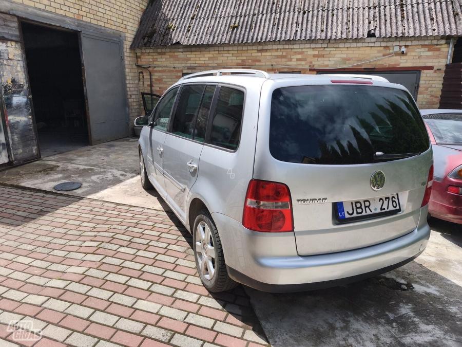 Grey Volkswagen Touran 2005 in Vilnius, with an engine capacity of 1.90 L and mileage of 302 thousand km for 1700 €, photo 7 on AUTOMOTO.COM.LV