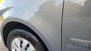 Grey Volkswagen Touran 2005 in Daugavpils, with an engine capacity of 1.90 L and mileage of 305 thousand km for 1500 €, photo 13 on AUTOMOTO.COM.LV