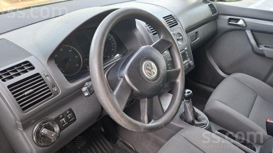 Grey Volkswagen Touran 2005 in Daugavpils, with an engine capacity of 1.90 L and mileage of 305 thousand km for 1500 €, photo 23 on AUTOMOTO.COM.LV