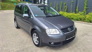Grey Volkswagen Touran 2005 in Vilnius, with an engine capacity of 1.97 L and mileage of 238 thousand km for 2950 €, photo 5 on AUTOMOTO.COM.LV