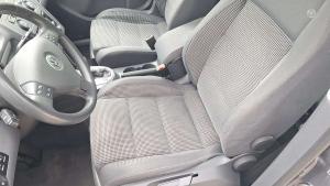 Grey Volkswagen Touran 2005 in Vilnius, with an engine capacity of 1.97 L and mileage of 238 thousand km for 2950 €, photo 17 on AUTOMOTO.COM.LV