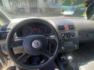 Grey Volkswagen Touran 2005 in Jelgava, with an engine capacity of 1.90 L and mileage of 301 thousand km for 1400 €, photo 12 on AUTOMOTO.COM.LV