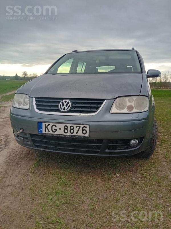 Grey Volkswagen Touran 2005 in Aizkraukle, with an engine capacity of 2.00 L and mileage of 263 thousand km for 500 €, photo 1 on AUTOMOTO.COM.LV
