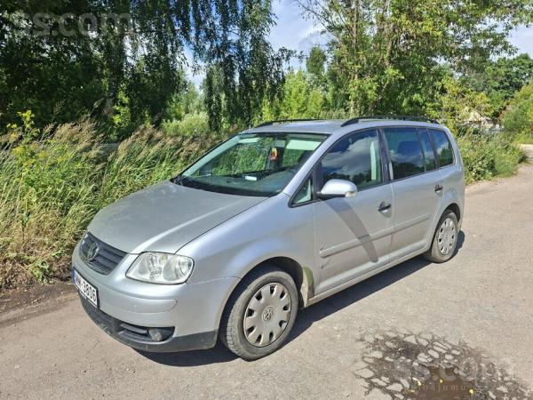 Pelēks Volkswagen Touran 2005 Rēzekne, ar dzinēja tilpumu 1.90 L un nobraukumu 308 tūkst. km par 1200 €, foto 2 vietnē AUTOMOTO.COM.LV