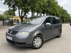 Grey Volkswagen Touran 2005 in Panevezys, with an engine capacity of 2.00 L and mileage of 0 thousand km for 450 €, photo  on AUTOMOTO.COM.LV