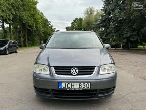 Grey Volkswagen Touran 2005 in Panevezys, with an engine capacity of 2.00 L and mileage of 290 thousand km for 450 €, photo 3 on AUTOMOTO.COM.LV