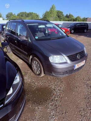 Grey Volkswagen Touran 2005 in Jurbarkas, with an engine capacity of 1.90 L and mileage of 300 thousand km for 2399 €, photo  on AUTOMOTO.COM.LV