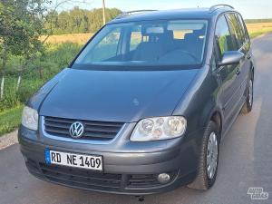 Pelēks Volkswagen Touran 2005 Mažeikiai, ar dzinēja tilpumu 1.90 L un nobraukumu 290 tūkst. km par 3150 €, foto 6 vietnē AUTOMOTO.COM.LV