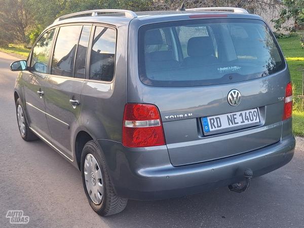 Grey Volkswagen Touran 2005 in Mazeikiai, with an engine capacity of 1.90 L and mileage of 290 thousand km for 3150 €, photo 10 on AUTOMOTO.COM.LV