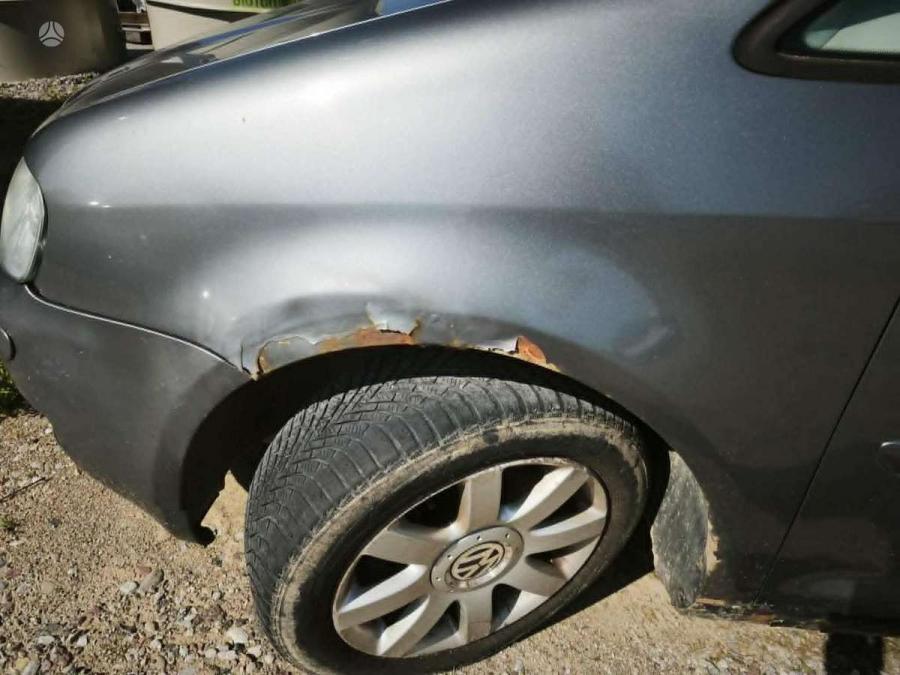 Grey Volkswagen Touran 2005 in Klaipeda, with an engine capacity of 1.90 L and mileage of 270 thousand km for 500 €, photo 16 on AUTOMOTO.COM.LV