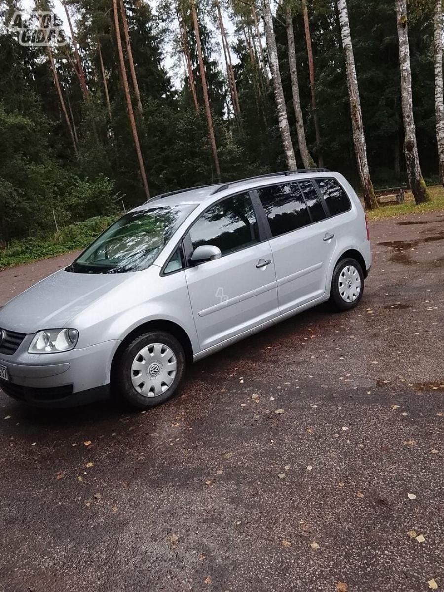 Grey Volkswagen Touran 2005 in Taurage, with an engine capacity of 1.90 L and mileage of 294 thousand km for 2100 €, photo 4 on AUTOMOTO.COM.LV