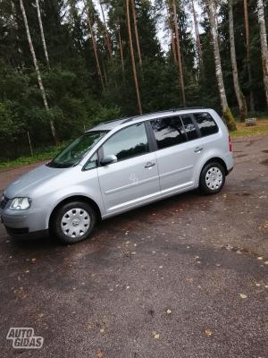 Grey Volkswagen Touran 2005 in Taurage, with an engine capacity of 1.90 L and mileage of 294 thousand km for 2100 €, photo 5 on AUTOMOTO.COM.LV