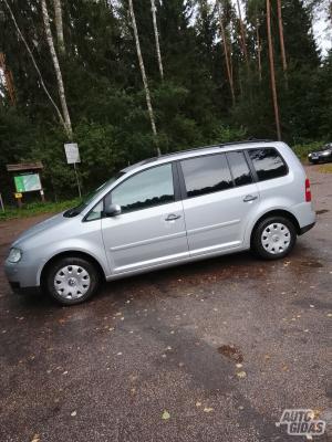 Grey Volkswagen Touran 2005 in Taurage, with an engine capacity of 1.90 L and mileage of 294 thousand km for 2100 €, photo 6 on AUTOMOTO.COM.LV