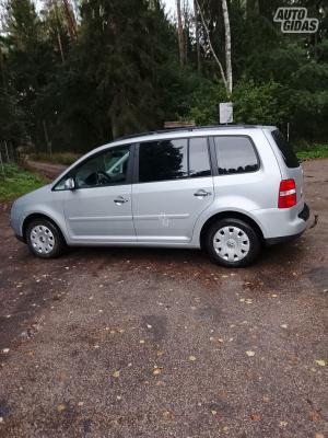 Grey Volkswagen Touran 2005 in Taurage, with an engine capacity of 1.90 L and mileage of 294 thousand km for 2100 €, photo 8 on AUTOMOTO.COM.LV