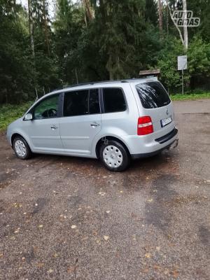 Grey Volkswagen Touran 2005 in Taurage, with an engine capacity of 1.90 L and mileage of 294 thousand km for 2100 €, photo 9 on AUTOMOTO.COM.LV