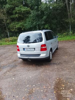 Grey Volkswagen Touran 2005 in Taurage, with an engine capacity of 1.90 L and mileage of 294 thousand km for 2100 €, photo 12 on AUTOMOTO.COM.LV