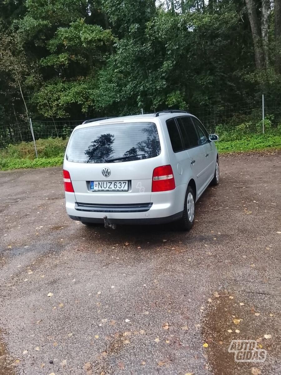 Grey Volkswagen Touran 2005 in Taurage, with an engine capacity of 1.90 L and mileage of 294 thousand km for 2100 €, photo 12 on AUTOMOTO.COM.LV