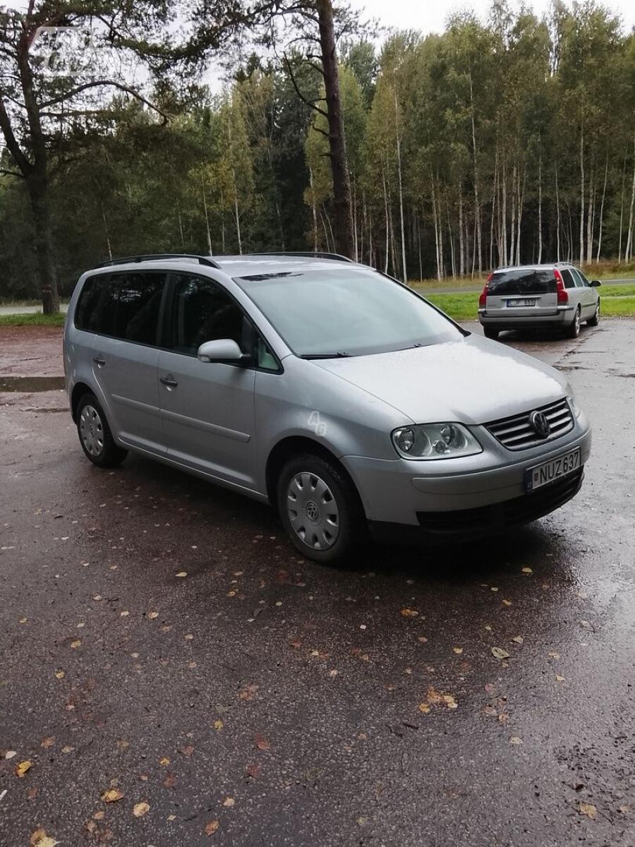 Grey Volkswagen Touran 2005 in Taurage, with an engine capacity of 1.90 L and mileage of 294 thousand km for 2100 €, photo 17 on AUTOMOTO.COM.LV