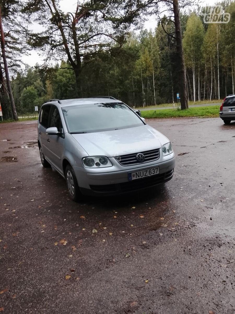 Grey Volkswagen Touran 2005 in Taurage, with an engine capacity of 1.90 L and mileage of 294 thousand km for 2100 €, photo 18 on AUTOMOTO.COM.LV
