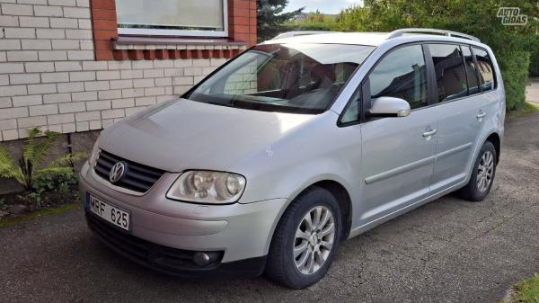 Grey Volkswagen Touran 2005 in Vilnius, with an engine capacity of 1.90 L and mileage of 360 thousand km for 1300 €, photo 1 on AUTOMOTO.COM.LV