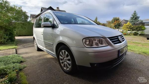 Grey Volkswagen Touran 2005 in Vilnius, with an engine capacity of 1.90 L and mileage of 360 thousand km for 1300 €, photo 3 on AUTOMOTO.COM.LV