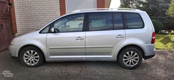 Grey Volkswagen Touran 2005 in Vilnius, with an engine capacity of 1.90 L and mileage of 360 thousand km for 1300 €, photo 4 on AUTOMOTO.COM.LV