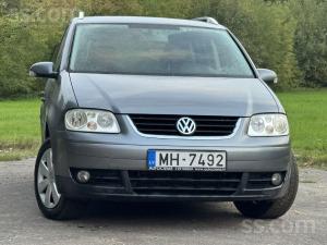 Pelēks Volkswagen Touran 2005 Rīga, ar dzinēja tilpumu 1.90 L un nobraukumu 344 tūkst. km par 1800 €, foto 4 vietnē AUTOMOTO.COM.LV