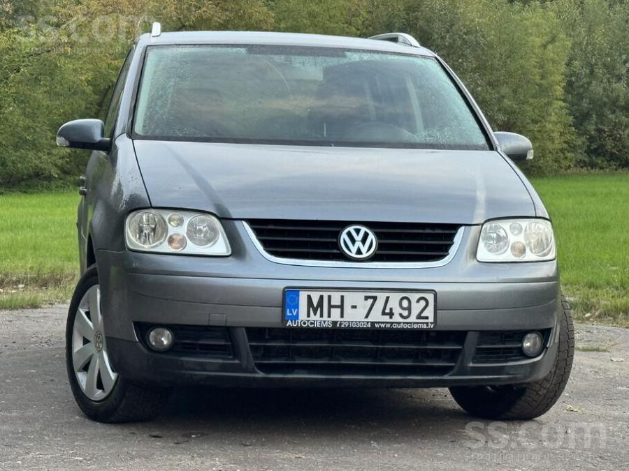 Pelēks Volkswagen Touran 2005 Rīga, ar dzinēja tilpumu 1.90 L un nobraukumu 344 tūkst. km par 1800 €, foto 4 vietnē AUTOMOTO.COM.LV