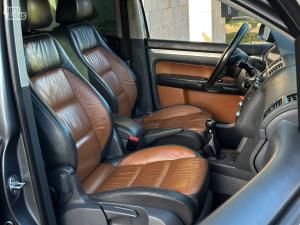 Pelēks Volkswagen Touran 2005 Kauņa, ar dzinēja tilpumu 1.90 L un nobraukumu 323 tūkst. km par 2650 €, foto 22 vietnē AUTOMOTO.COM.LV