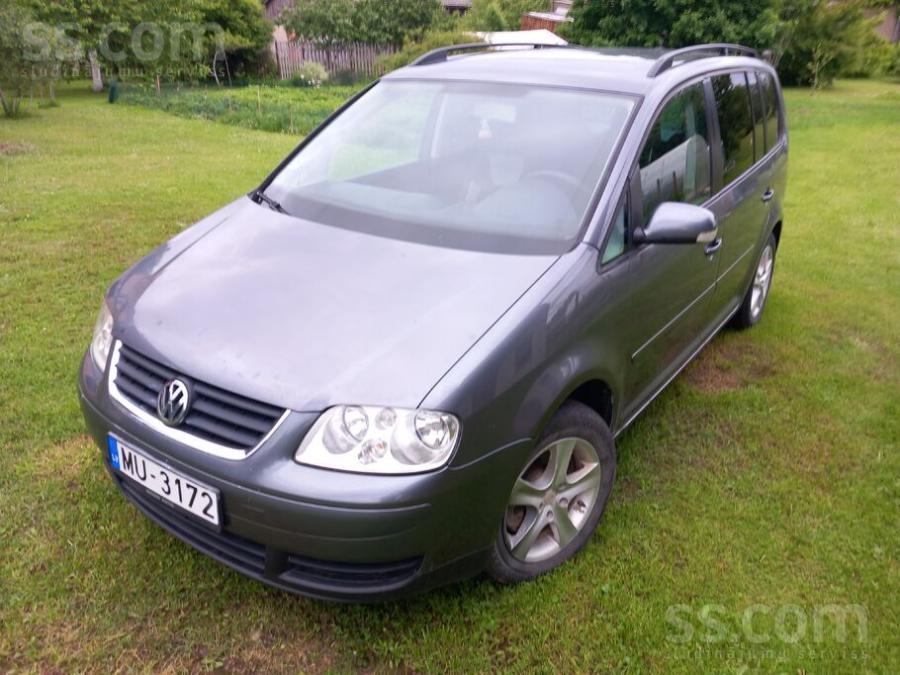 Grey Volkswagen Touran 2006 in Tukums, with an engine capacity of 1.90 L and mileage of 319 thousand km for 3700 €, photo 1 on AUTOMOTO.COM.LV