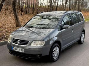 Grey Volkswagen Touran 2006 in Vilnius, with an engine capacity of 1.90 L and mileage of 279 thousand km for 2900 €, photo  on AUTOMOTO.COM.LV