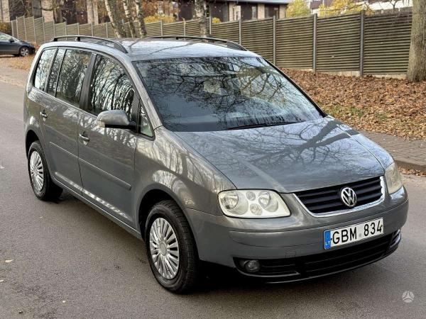 Grey Volkswagen Touran 2006 in Vilnius, with an engine capacity of 1.90 L and mileage of 279 thousand km for 2900 €, photo 2 on AUTOMOTO.COM.LV