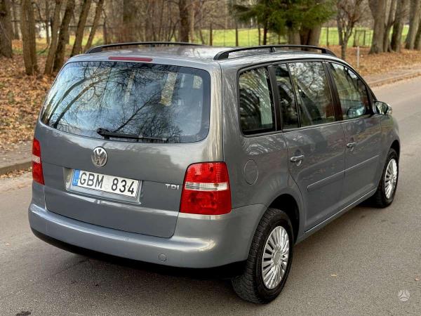 Grey Volkswagen Touran 2006 in Vilnius, with an engine capacity of 1.90 L and mileage of 279 thousand km for 2900 €, photo 5 on AUTOMOTO.COM.LV