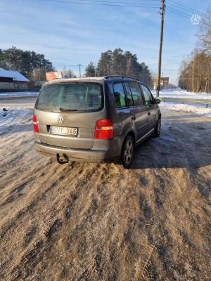 Grey Volkswagen Touran 2006 in Jurbarkas, with an engine capacity of 1.90 L and mileage of 335 thousand km for 2750 €, photo 5 on AUTOMOTO.COM.LV