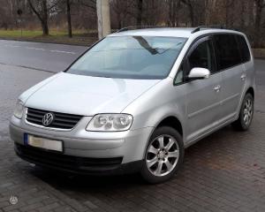 Pelēks Volkswagen Touran 2006 Viļņa, ar dzinēja tilpumu 1.60 L un nobraukumu 191 tūkst. km par 2499 €, foto  vietnē AUTOMOTO.COM.LV