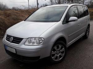 Pelēks Volkswagen Touran 2006 Viļņa, ar dzinēja tilpumu 1.60 L un nobraukumu 191 tūkst. km par 2499 €, foto 4 vietnē AUTOMOTO.COM.LV