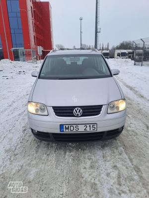 Grey Volkswagen Touran 2006 in Klaipeda, with an engine capacity of 2.00 L and mileage of 325 thousand km for 1750 €, photo 2 on AUTOMOTO.COM.LV