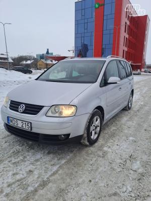 Grey Volkswagen Touran 2006 in Klaipeda, with an engine capacity of 2.00 L and mileage of 325 thousand km for 1750 €, photo 3 on AUTOMOTO.COM.LV