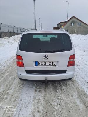 Grey Volkswagen Touran 2006 in Klaipeda, with an engine capacity of 2.00 L and mileage of 325 thousand km for 1750 €, photo 6 on AUTOMOTO.COM.LV